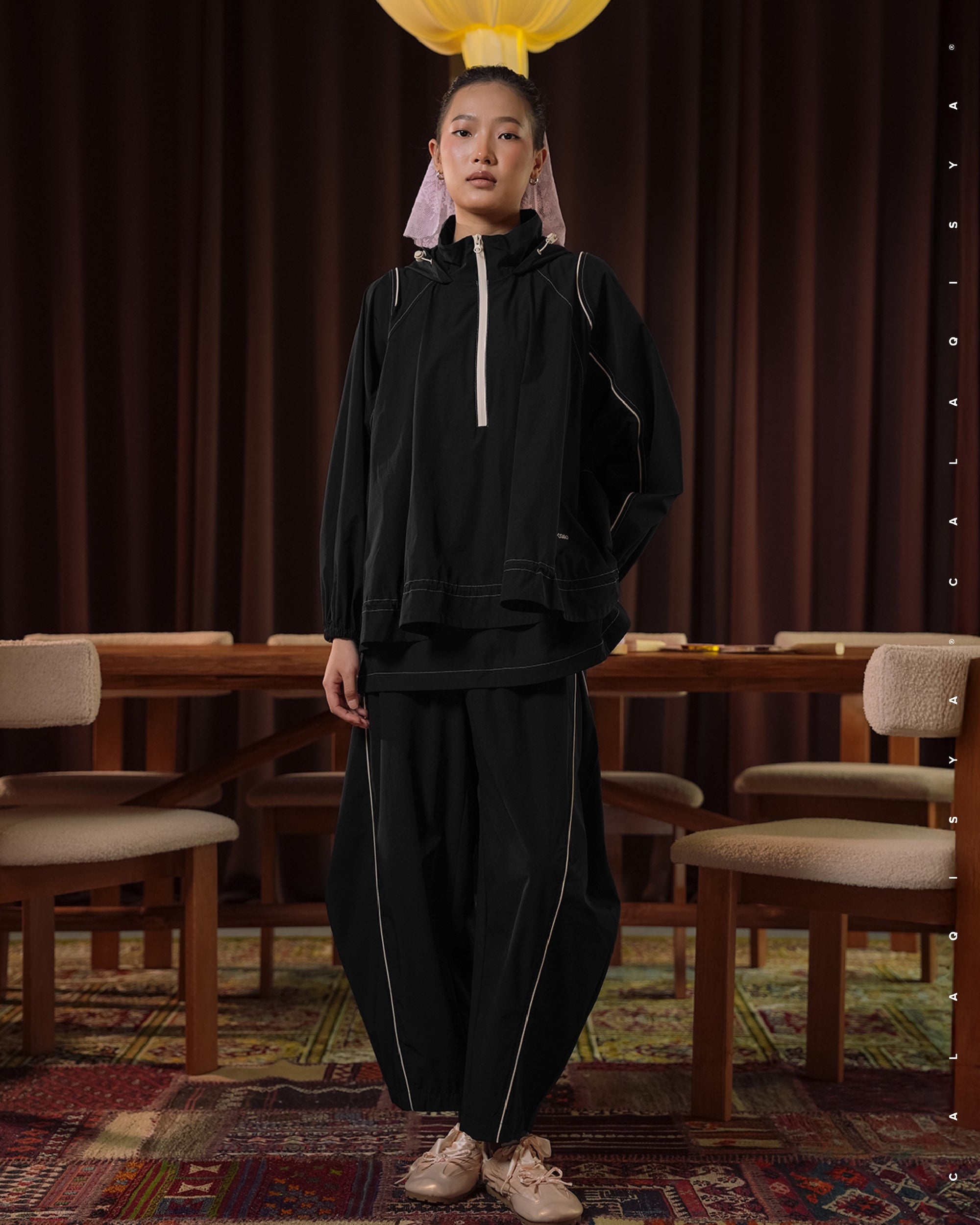 CQ GO RUFFLE PARKA IN BLACK – CalaQisya